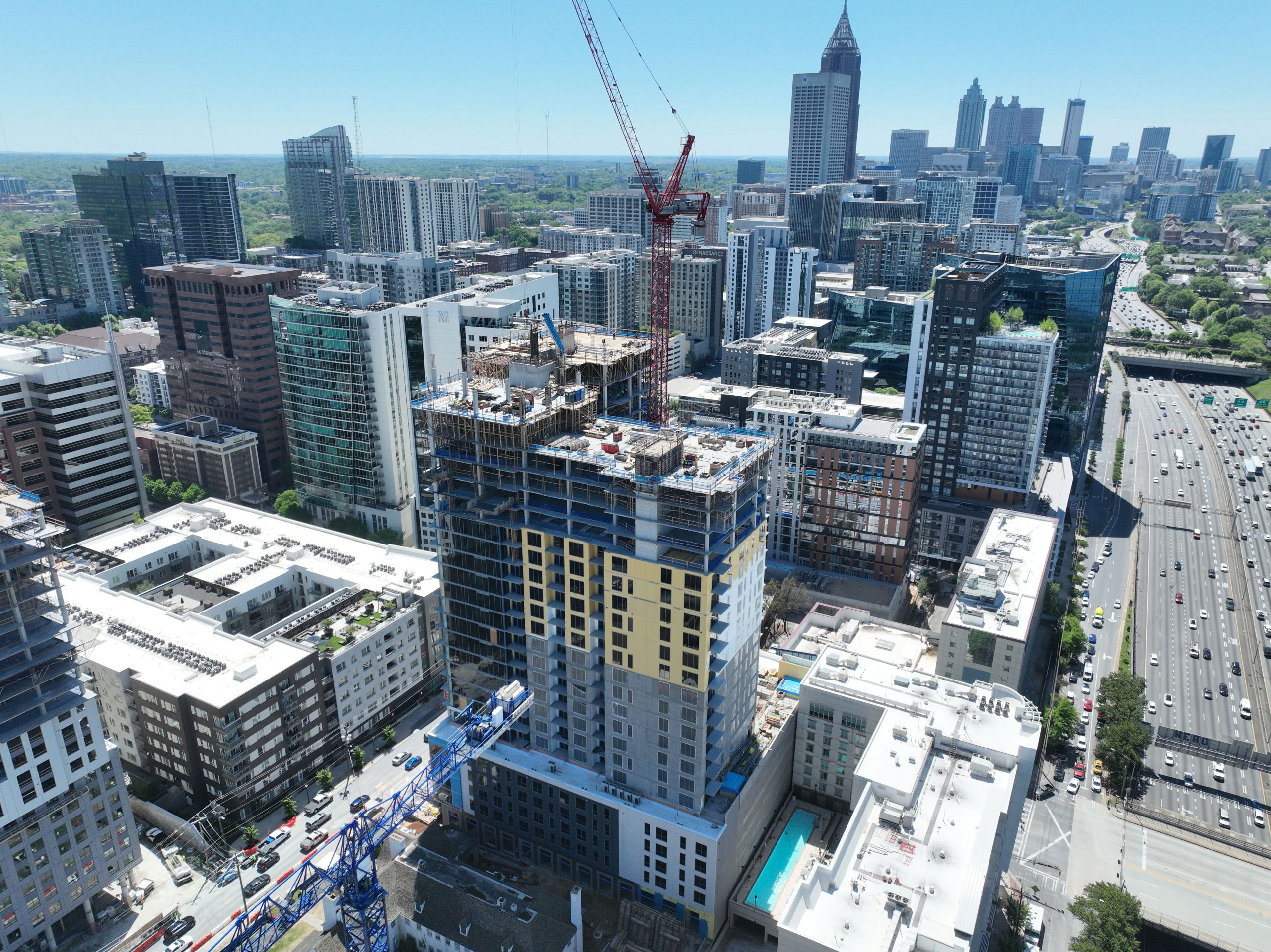 Portman's first residential tower in Atlanta has topped out - Portman